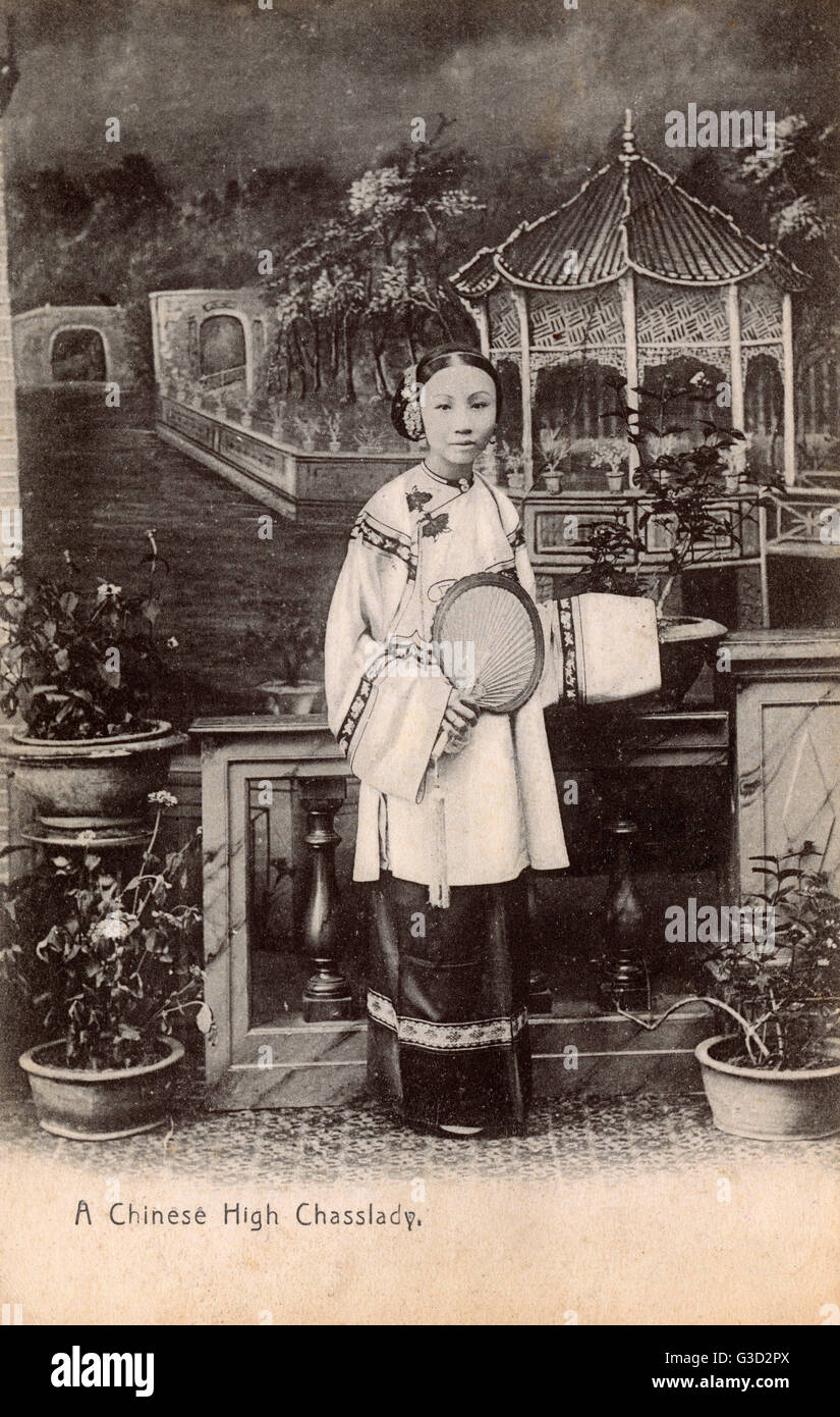 China - High Class lady - Studio Portrait holding fan Stock Photo - Alamy