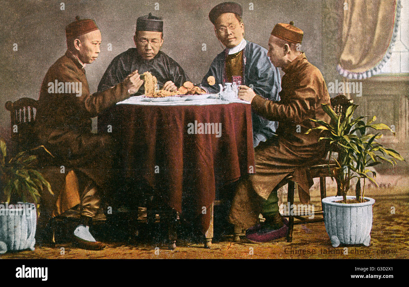 Four men share a meal, China Stock Photo - Alamy