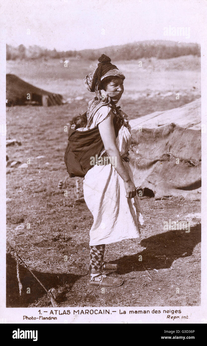 Woman of the Atlas Mountains, Morocco with baby Stock Photo - Alamy