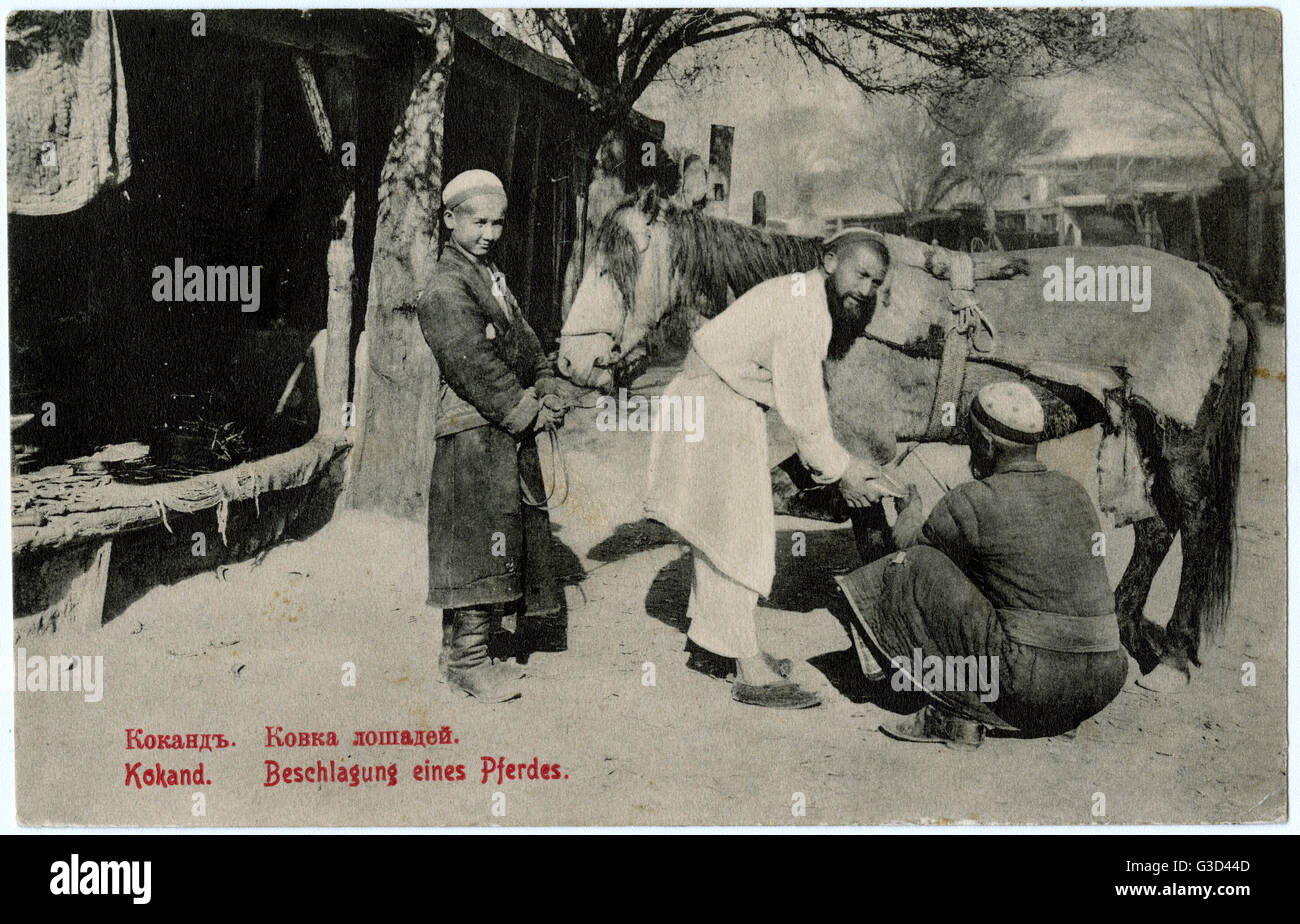Kokand, Uzbekistan - Shoeing a horse at the local forge Stock Photo - Alamy