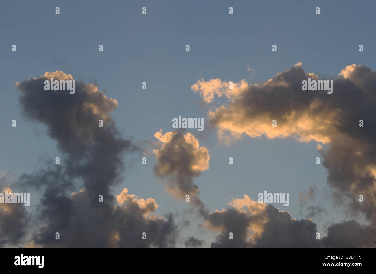 Clouds of different colors and shapes Stock Photo - Alamy