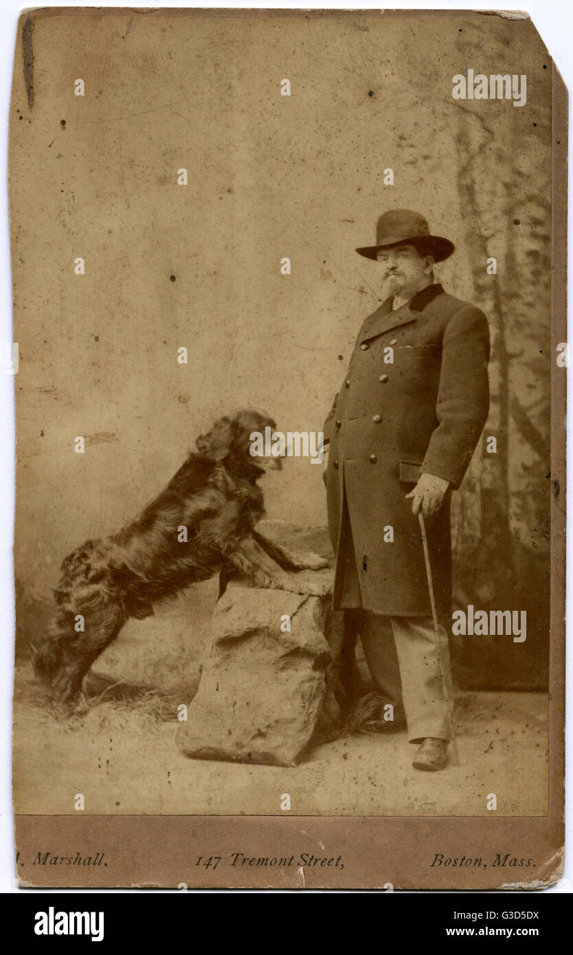 Studio portrait, man with his dog Stock Photo - Alamy