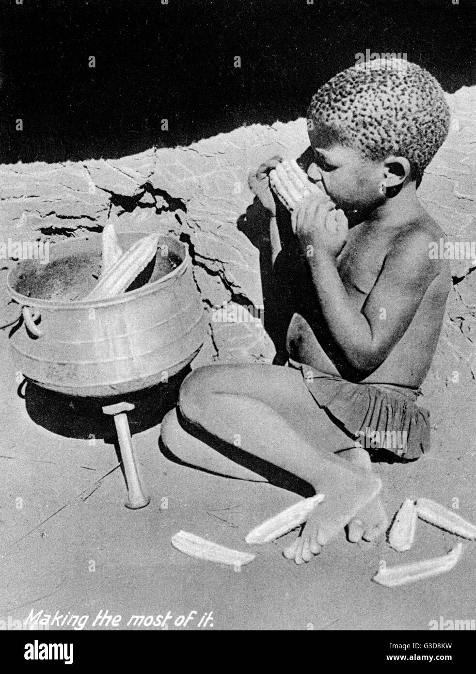 Native African Matabele boy eating Stock Photo - Alamy