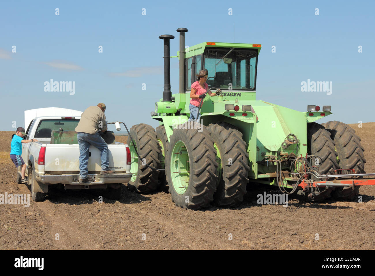 Fueling a Steiger Bearcat tractor on a farm in Alberta, Canada Stock ...