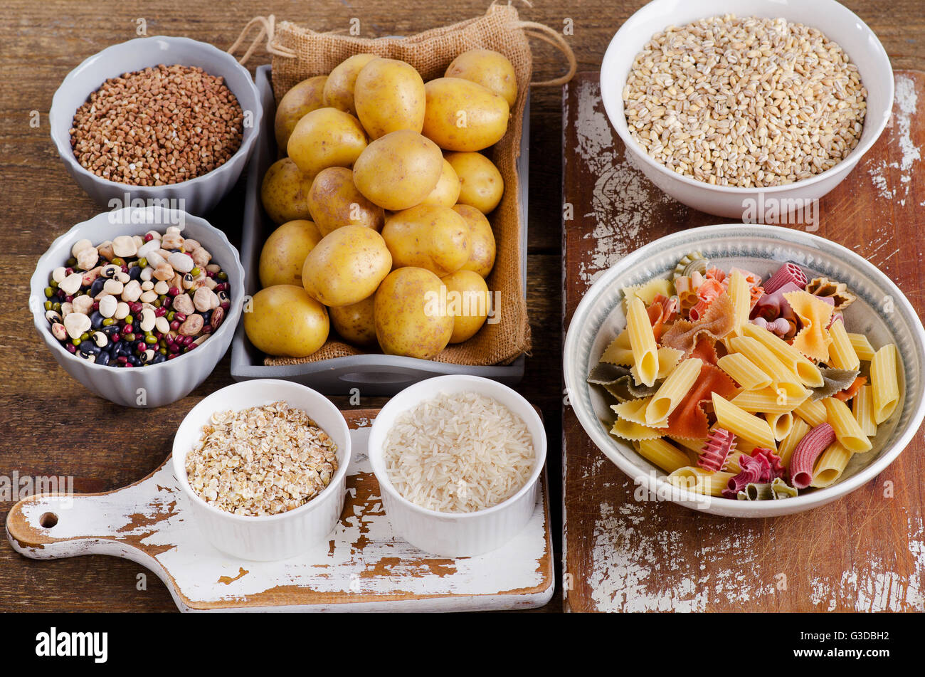 Healthy Food: Best Sources of Carbs on a wooden board. Top view Stock ...