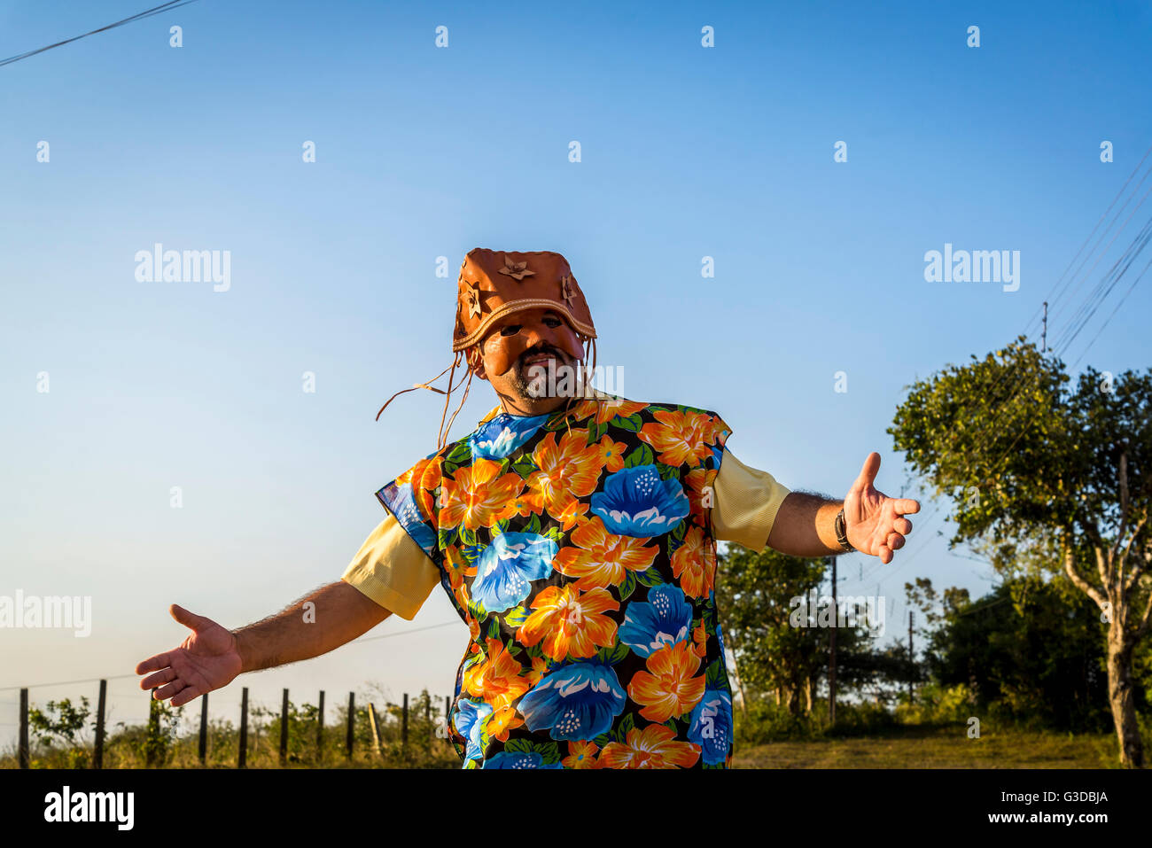 Man wearing Papangu mask and dress, Serra Negra, Bezerros, Pernambuco ...
