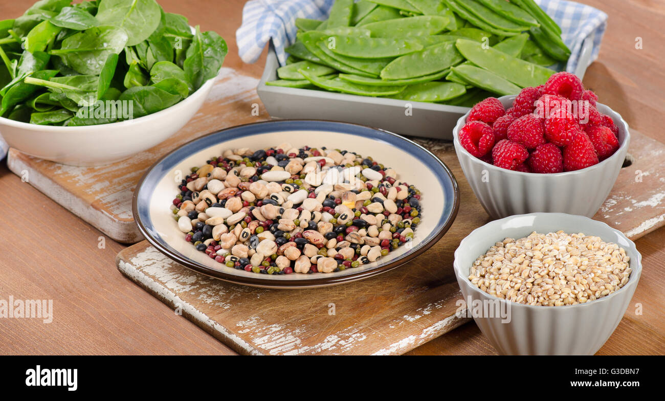 High Fiber Foods on wooden background. Selective focus Stock Photo - Alamy