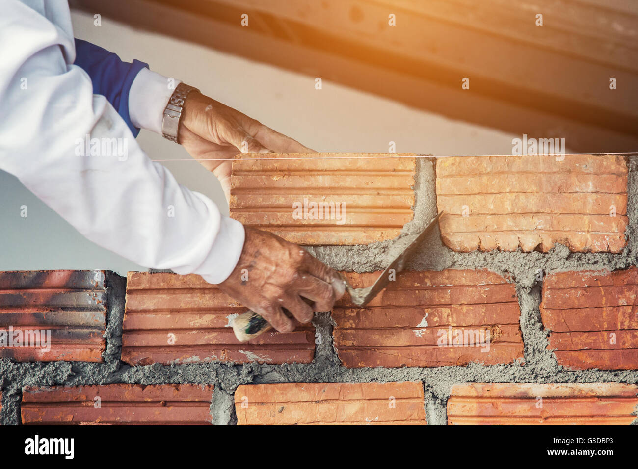 Cement masons and plasterer, brick for building Stock Photo - Alamy