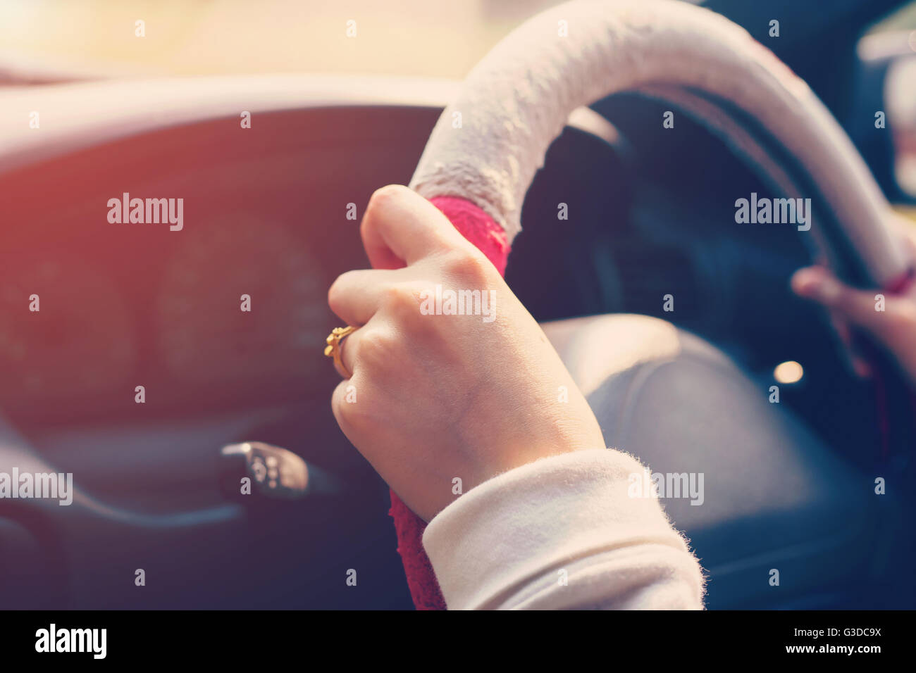 close up hand woman driving car on road with vintage tone Stock Photo ...