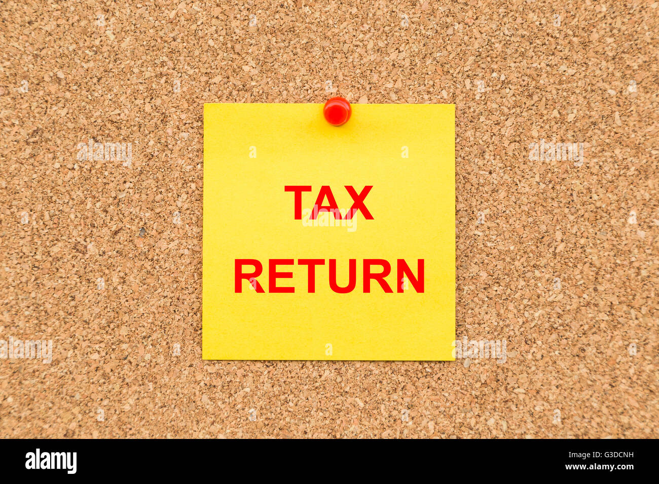 Yellow blank note and written TAX Return for reminder Stock Photo - Alamy