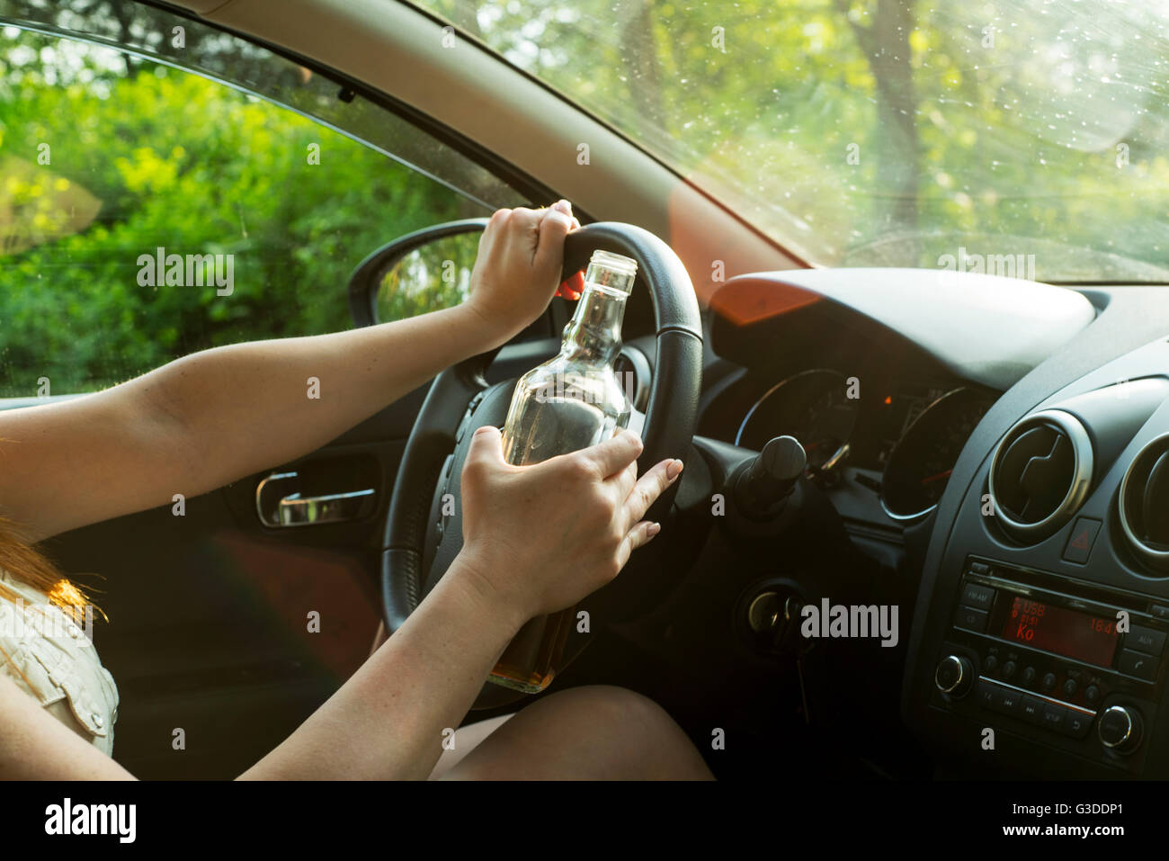 picture of woman drinking alcohol in the car Stock Photo - Alamy