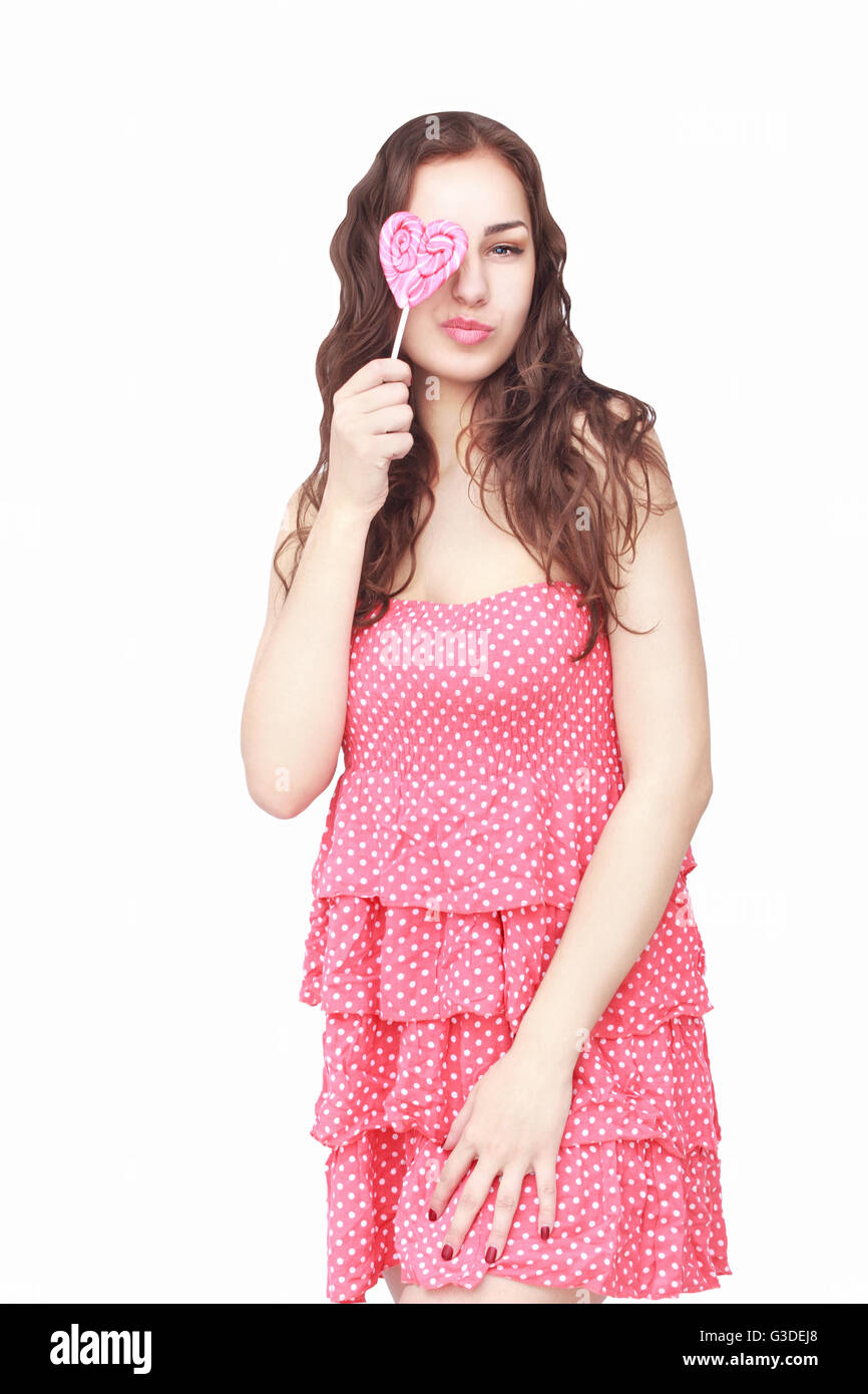 Happy woman in pink dress Stock Photo - Alamy
