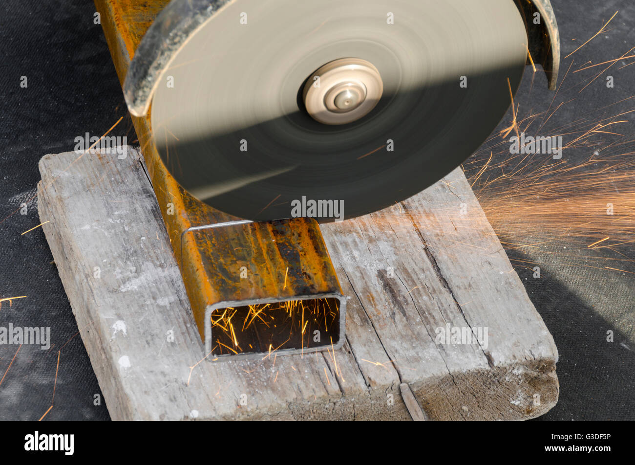 Saw disc while cutting a railing Stock Photo - Alamy