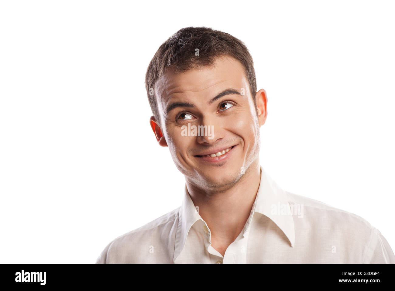 Handsome smiling young man looking up isolated Stock Photo - Alamy Handsome smiling young man looking up isolated Stock Photo - Alamy