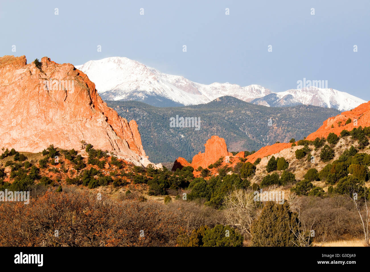 Sandstone spires and rock formations at the base of majestic Pikes Peak ...