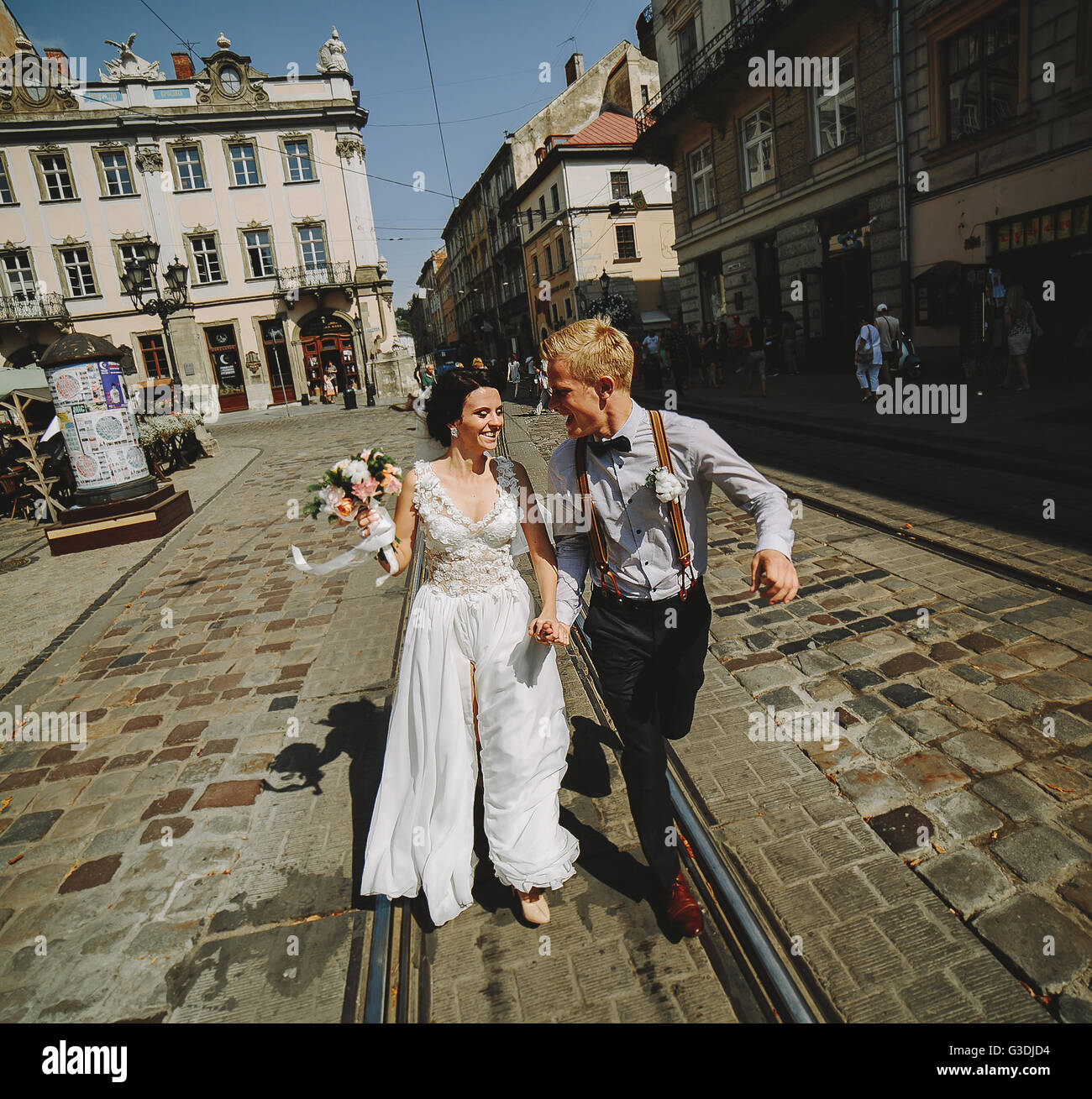 Bride and groom running hi-res stock photography and images - Alamy