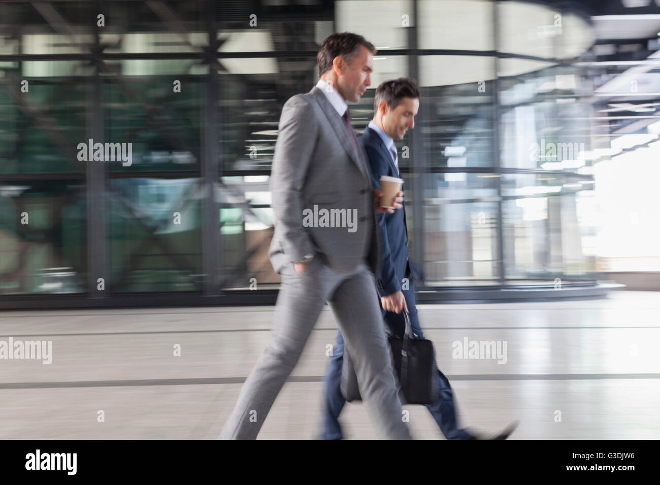 Man on side of building suit hi-res stock photography and images - Alamy