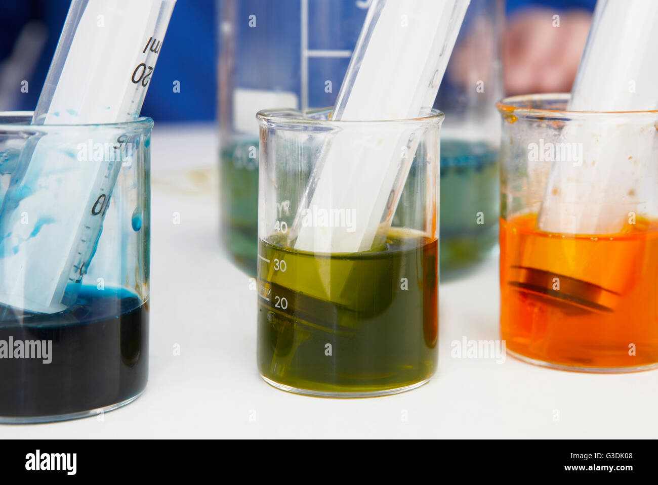 Test tubes with colorful liquids and syringes. Horizontal format Stock ...