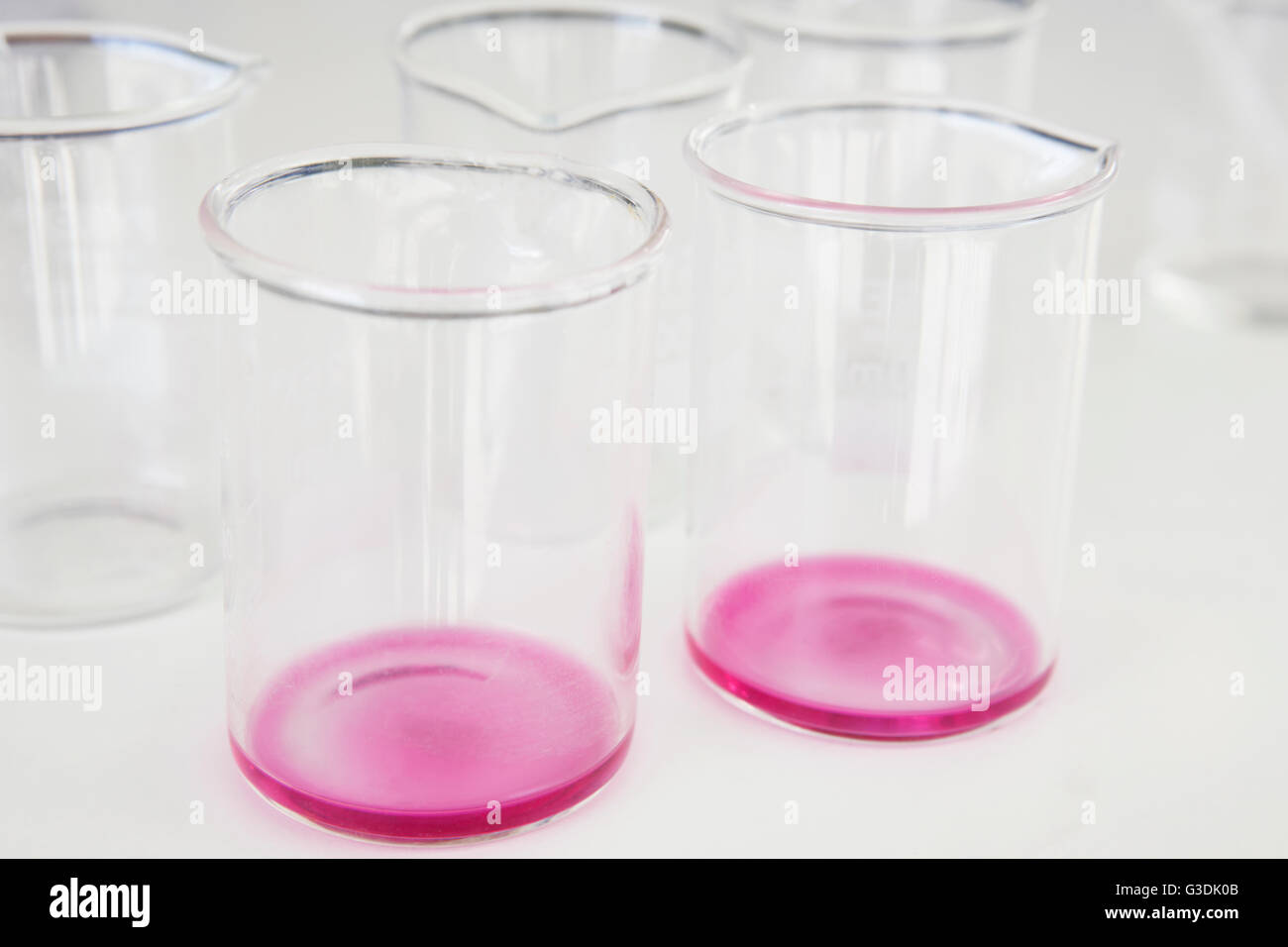 Test tubes with red liquid and white background. Horizontal format ...