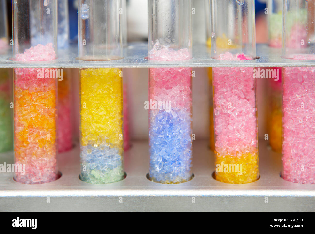 Test tubes with colorful mineral salts. Horizontal format Stock Photo ...