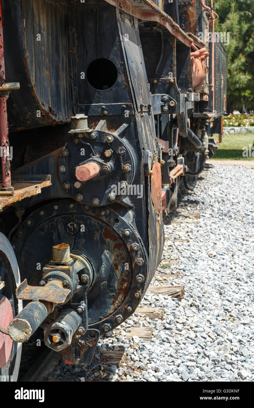 Close up detailed view of historical old rusty iron train locomotives ...