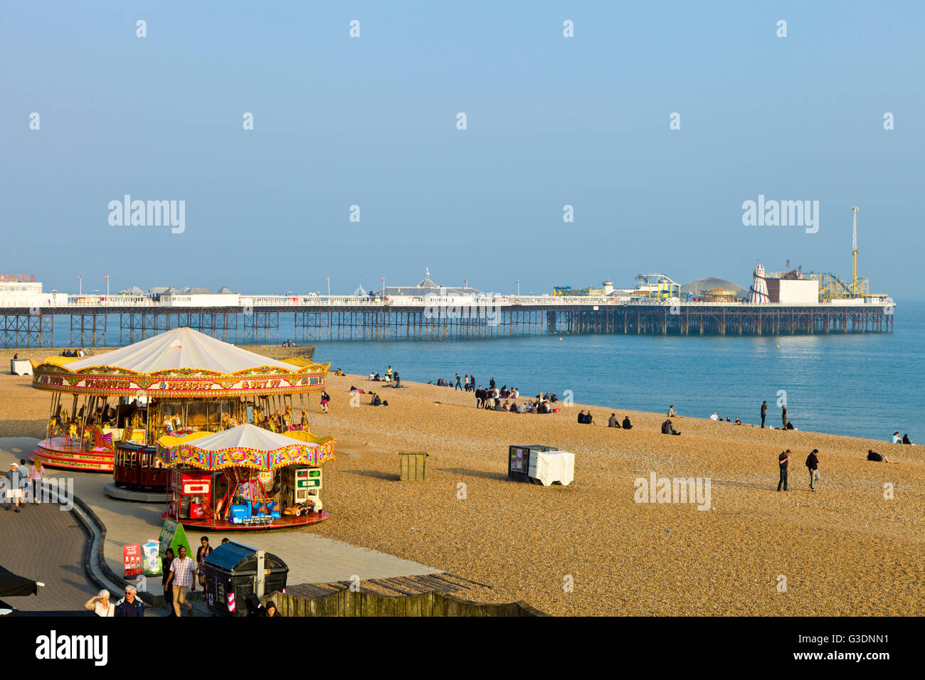 Brighton beach with the Palace and Pier in the background Stock Photo ...