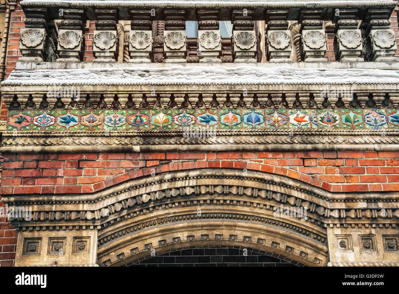The outer wall of an old building with beautiful bas-relief Stock Photo ...
