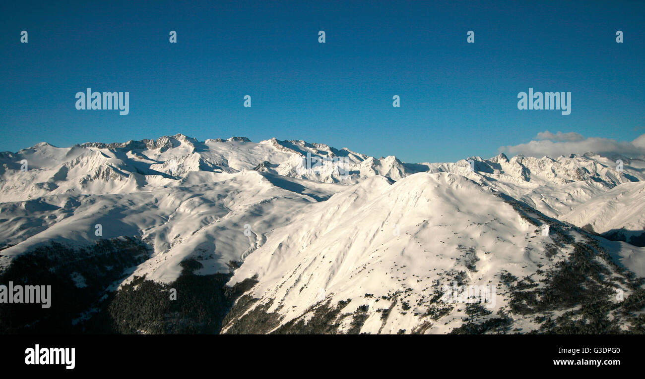 Aneto peak and Madaleta range from Valley Aran, aerial view. Pyrenees ...