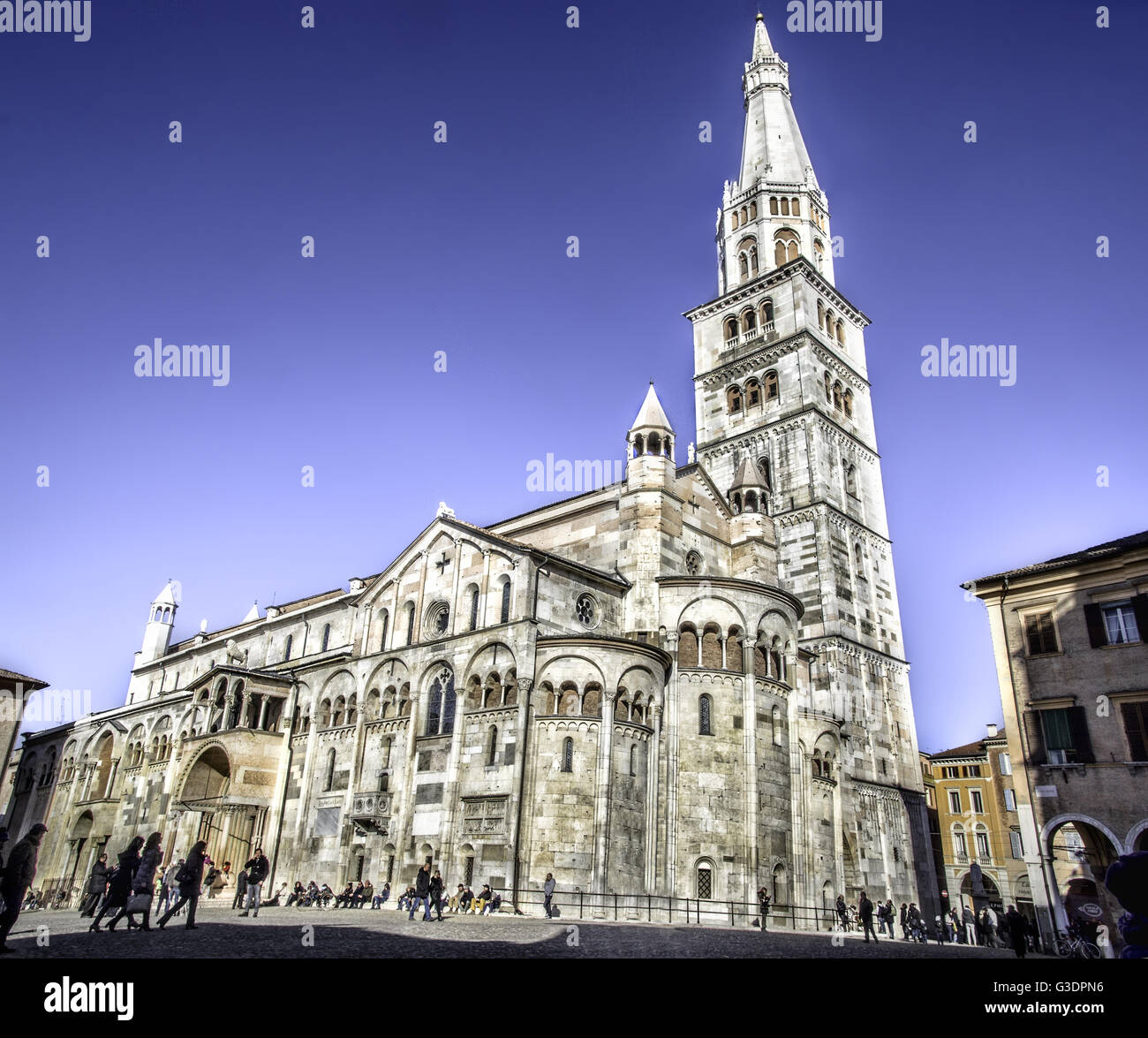 the imposing cathedral of Modena with its famous bell tower called the ...