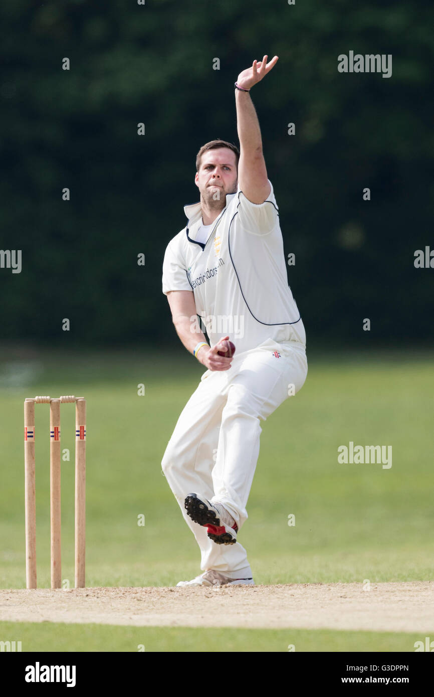 Man bowling in village cricket hi-res stock photography and images - Alamy
