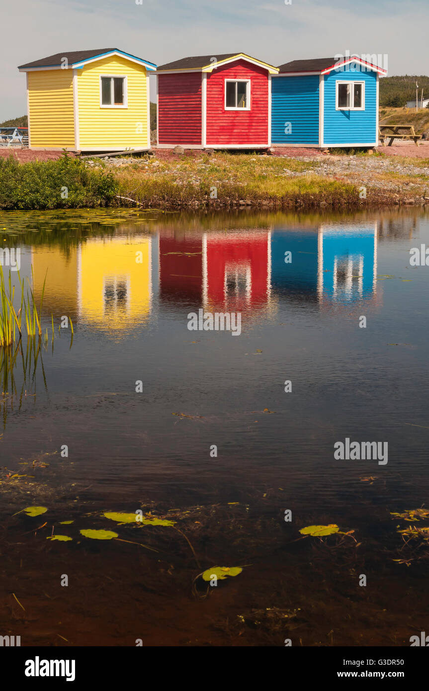 Colorful beach huts reflected in a pond, Cavendish, Trinity Bay, Avalon ...