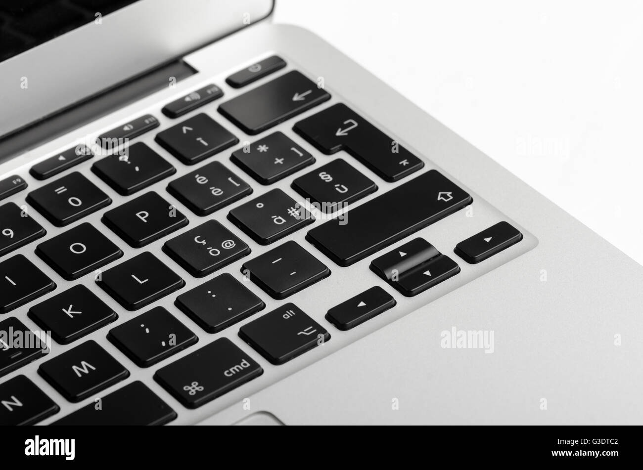 SIlver laptop's keyboard isolated on white background Stock Photo - Alamy