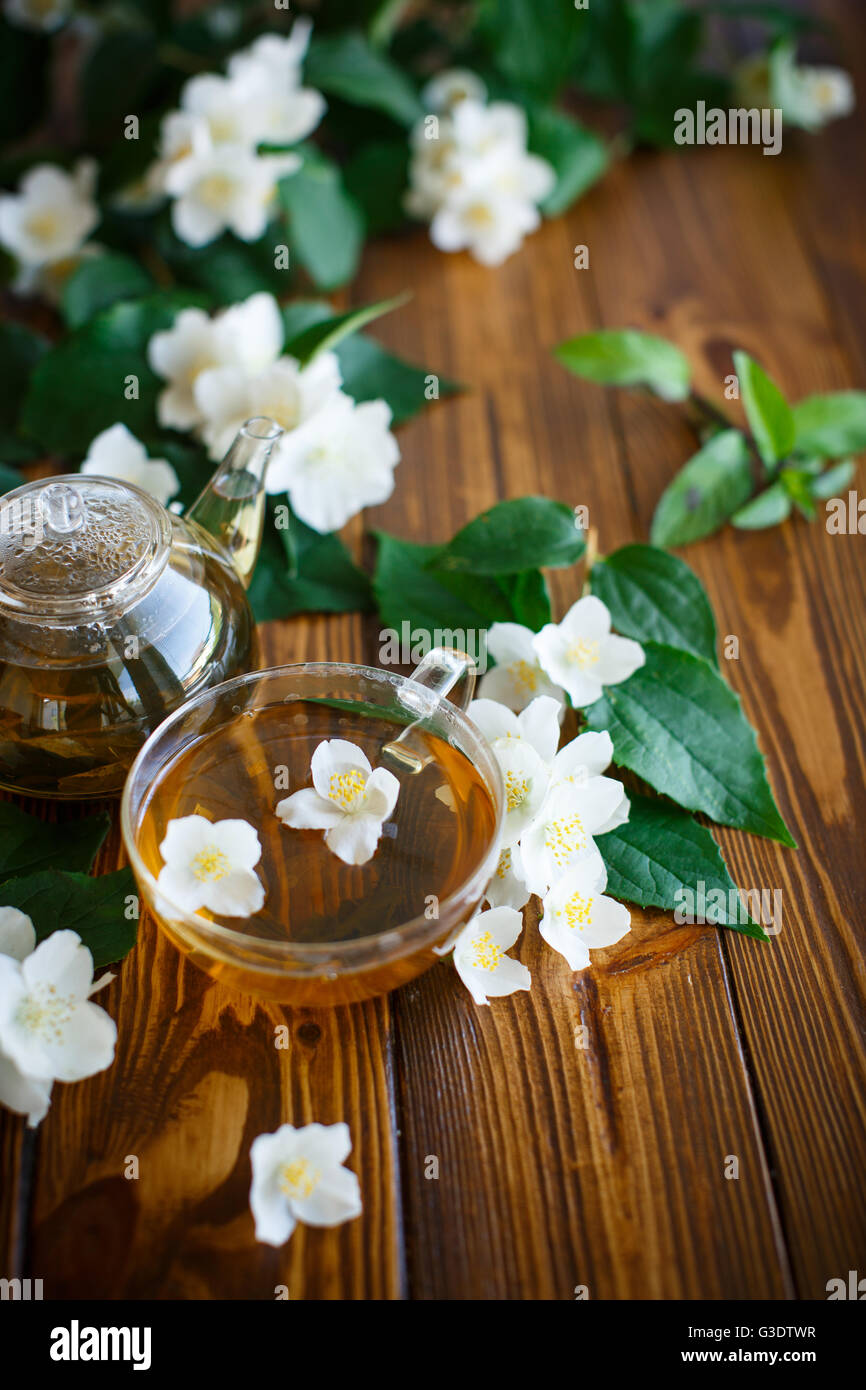 Jasmine tea in a glass pot Stock Photo - Alamy