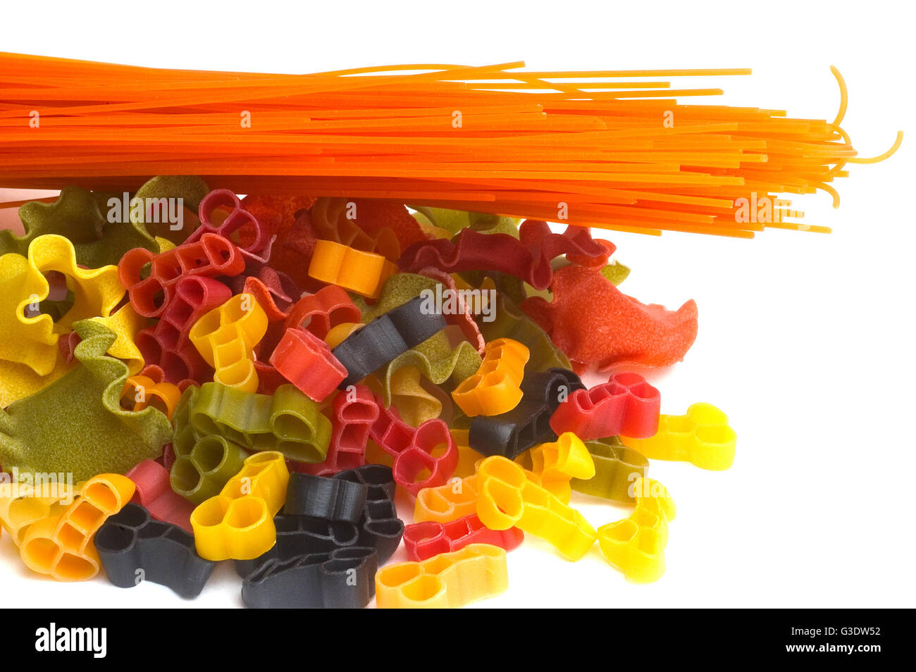 Italian colorful pasta in a funny shape photographed in studio on white ...