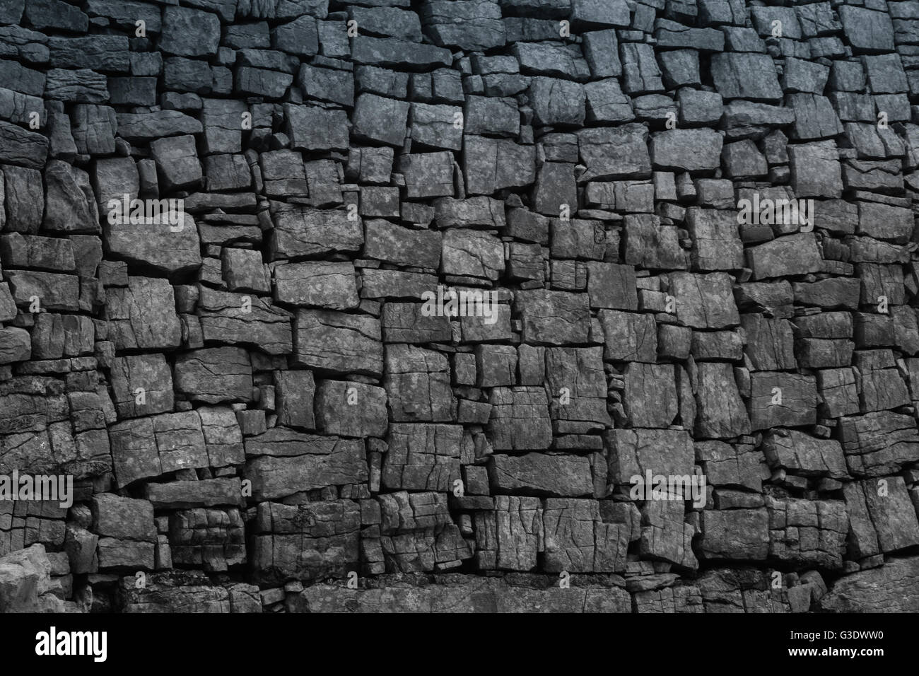 Northern Ireland coastal stone wall with irregular rock pattern. Stone ...