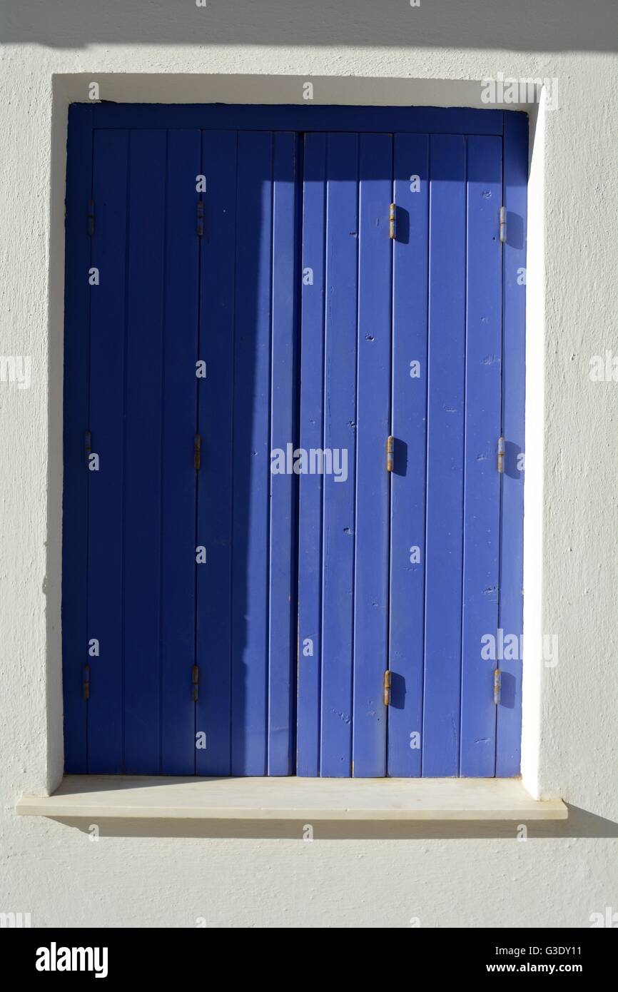 Window and shutters on a house in Skopelos Greece Stock Photo - Alamy