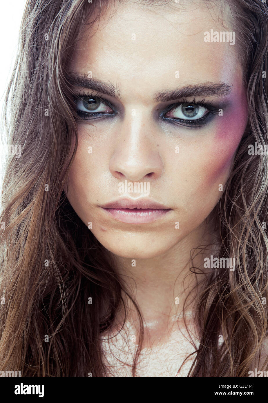 young beauty woman with makeup like shiner on face close up isolated ...
