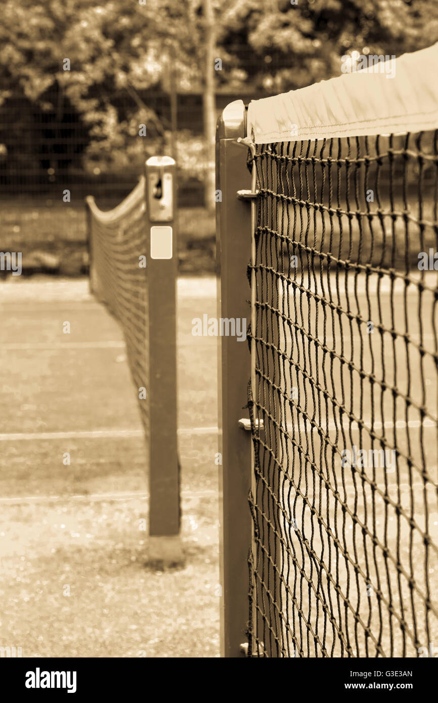 Tennis nets with a retro sepia filter applied Stock Photo - Alamy