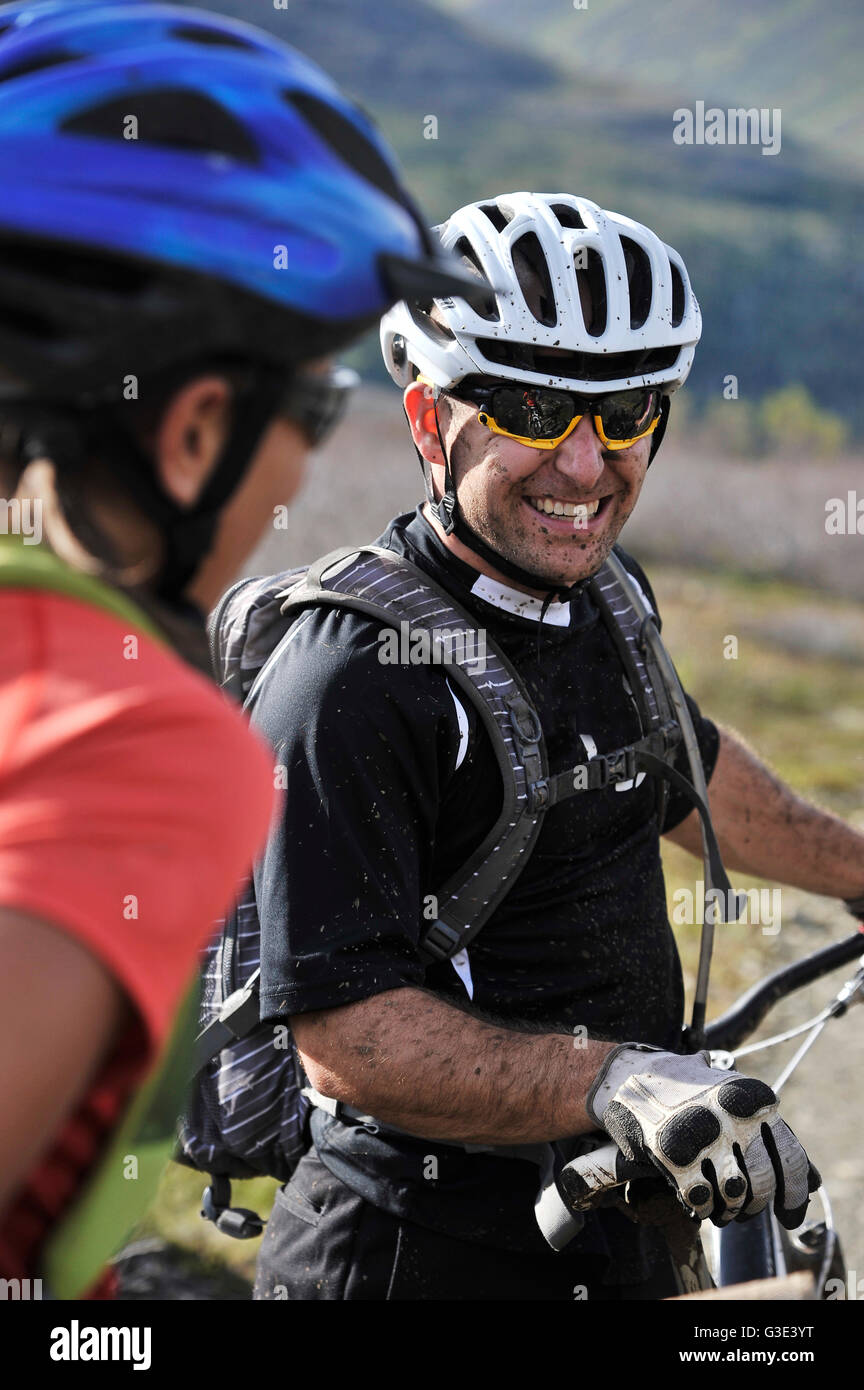 Muddy mountain bikers on the Resurrection Pass Trail in the Chugach ...