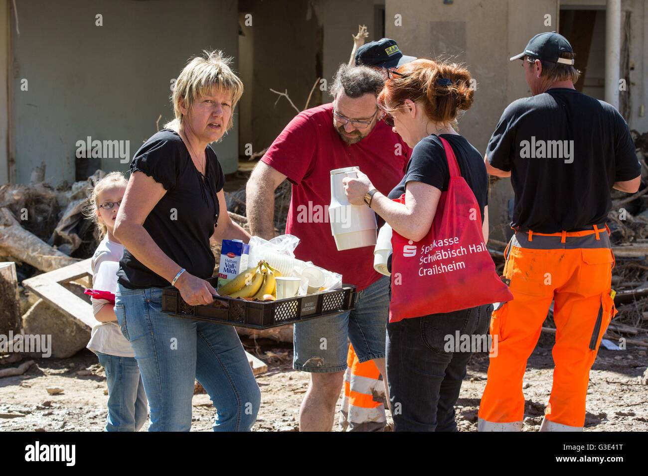 Flooding catastrophy, heavy devastation, civil volunteers helping ...
