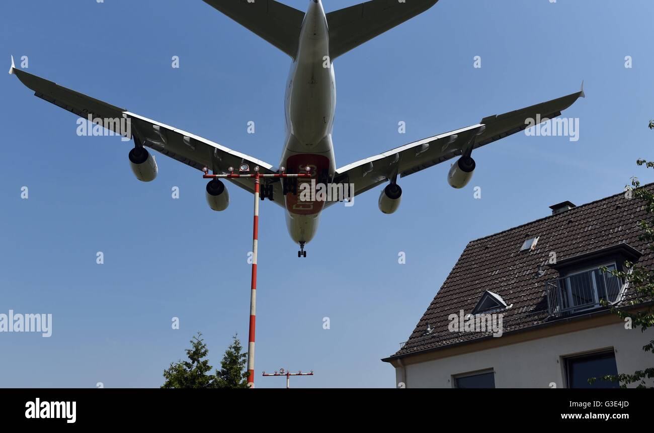 An Airbus A380 by Emirates Airlines very close to the roof of an ...