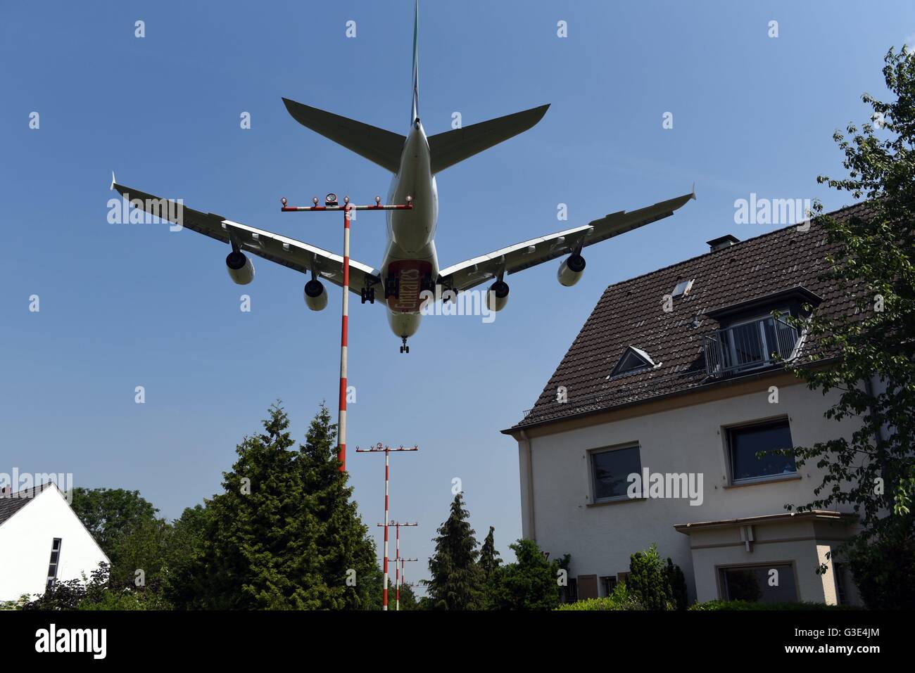 An Airbus A380 by Emirates Airlines very close to the roof of an ...