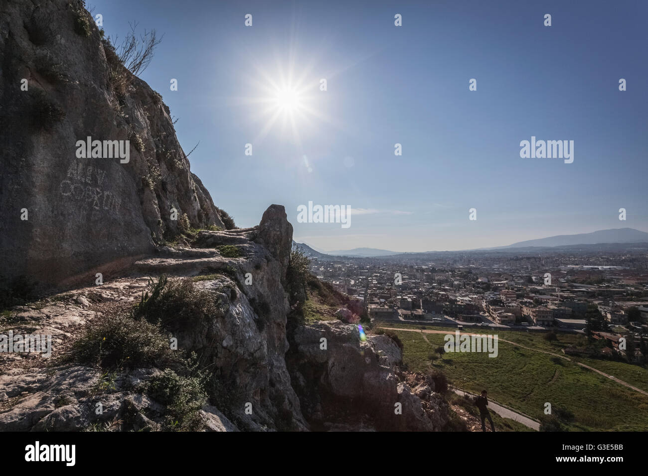 A path along the mountainside with a view of the city of Antioch ...