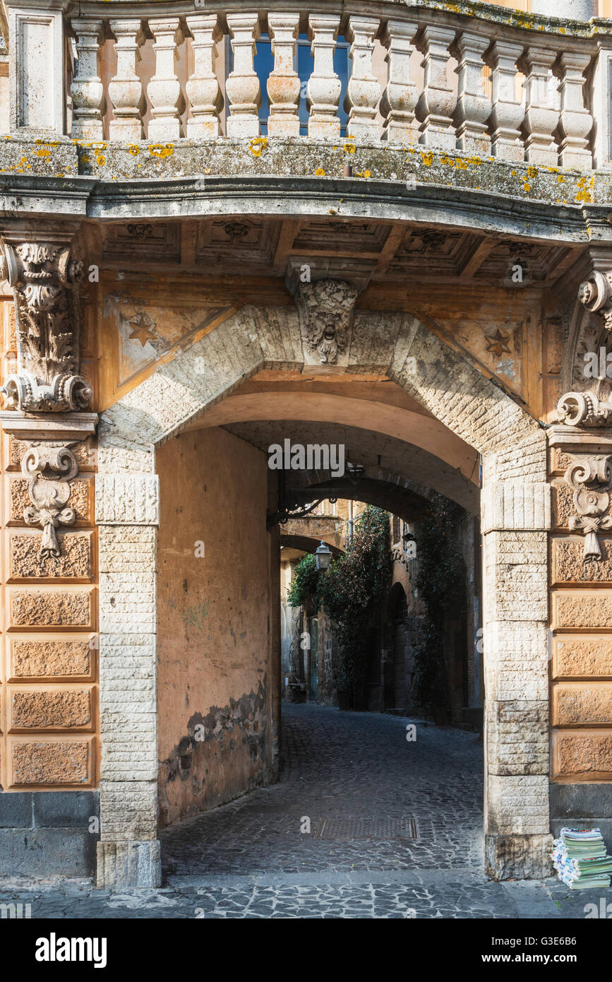 Facade of a building leading to a walkway and balusters overhead ...