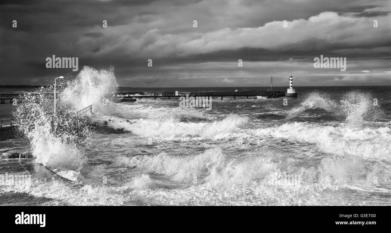 Lighthouse amble pier lighthouse Black and White Stock Photos & Images ...