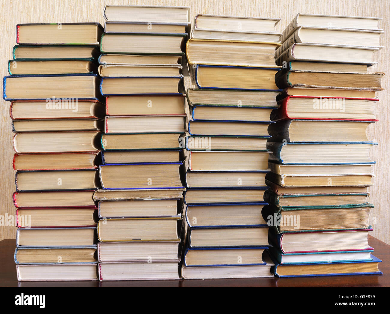 Many old books in a book shop or library, education and reading concept ...