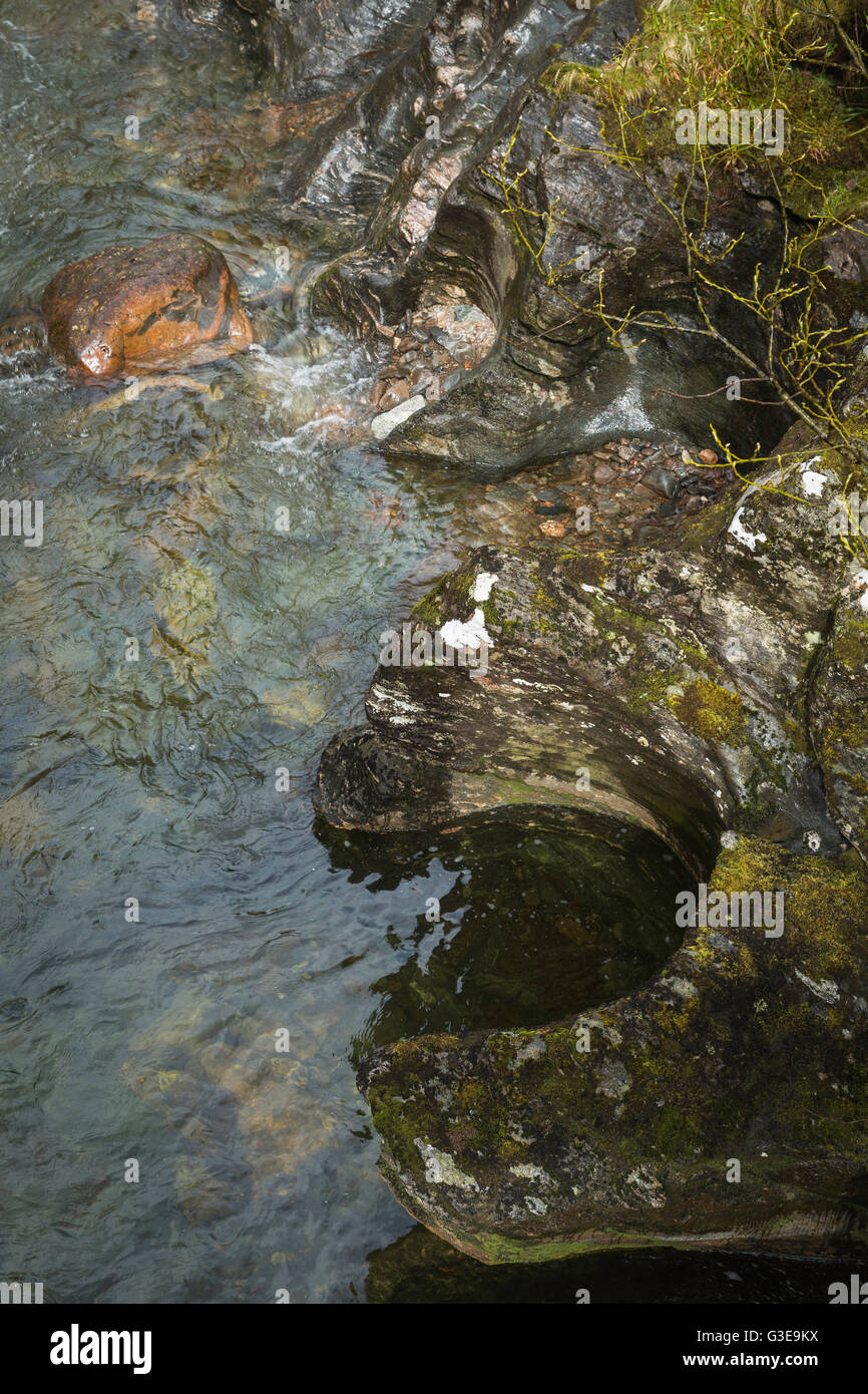 Strange eroded shapes in a Scottish burn Stock Photo - Alamy