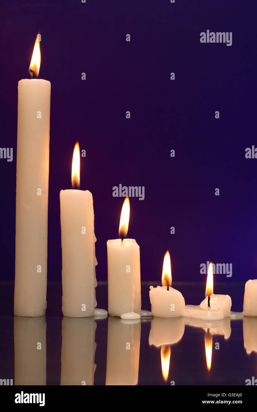 Set of lighting candles in a row on nice dark background Stock Photo ...