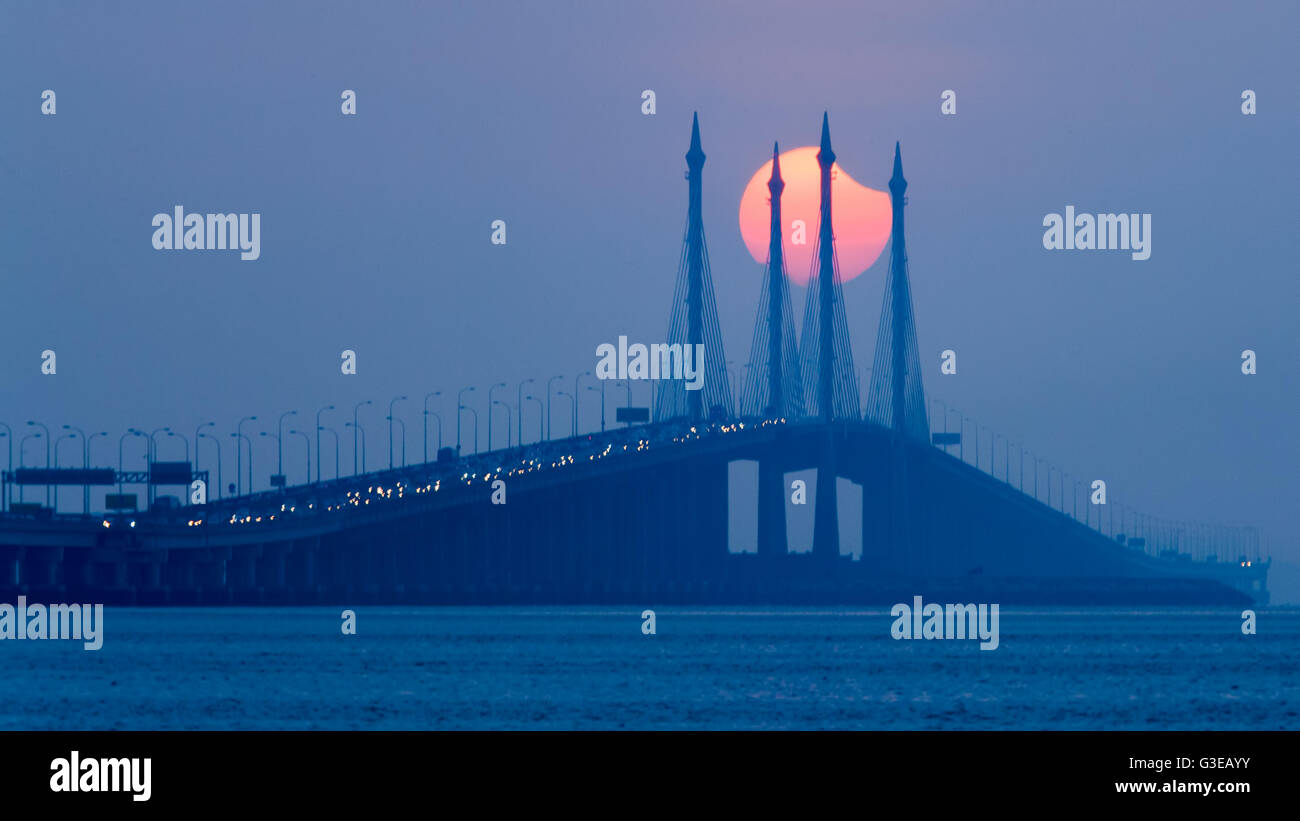 Silhouette penang bridge in sunrise hi-res stock photography and images ...
