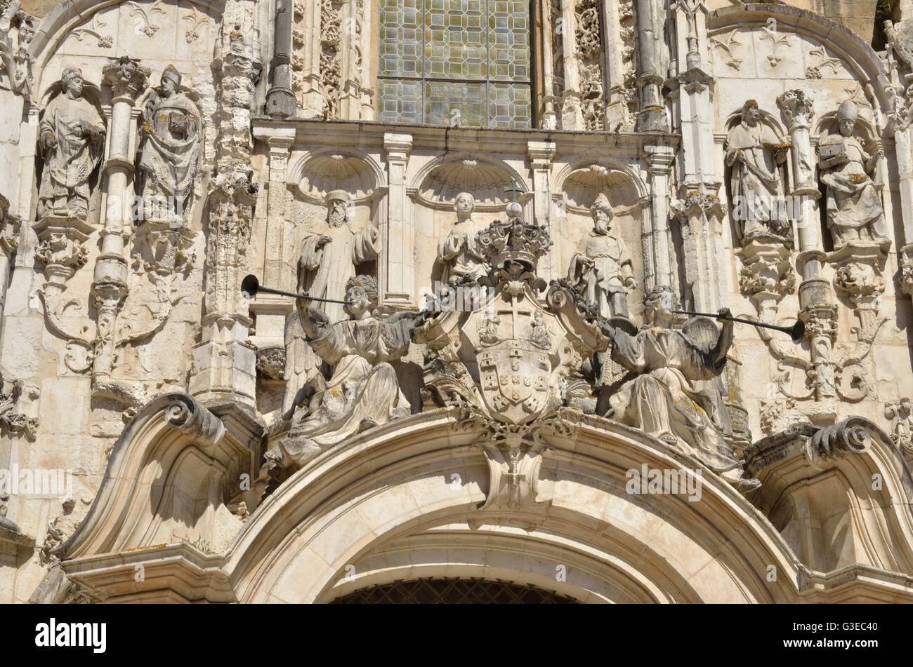 Detail of stone sculptures on facade of Monastery of the Holy Cross ...